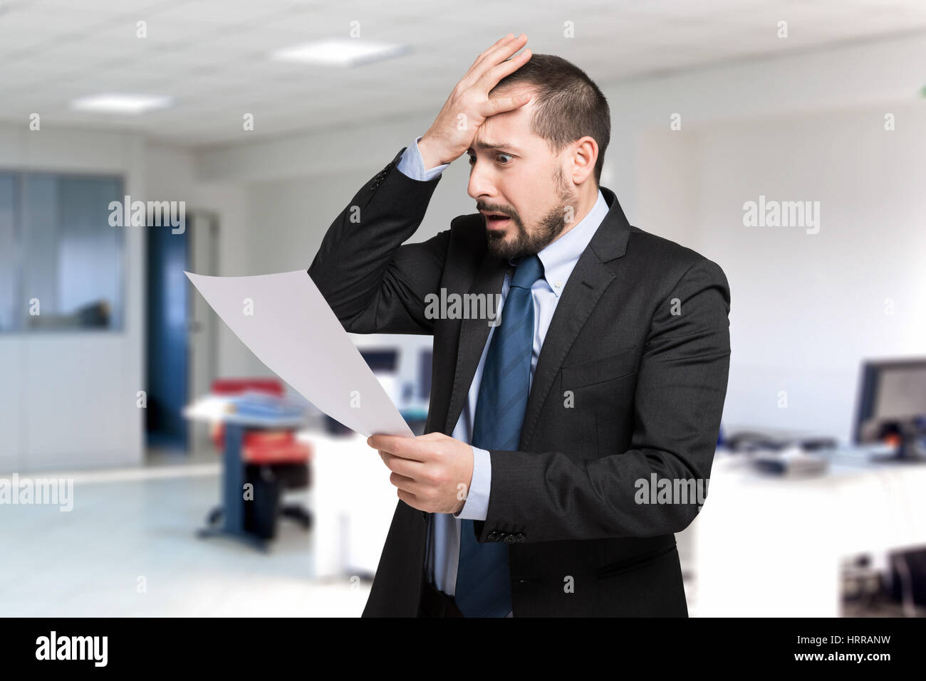 Sad man reading letter hi-res stock photography and images - Alamy