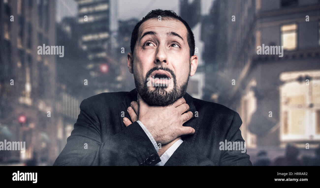 Man choking in a polluted city Stock Photo - Alamy