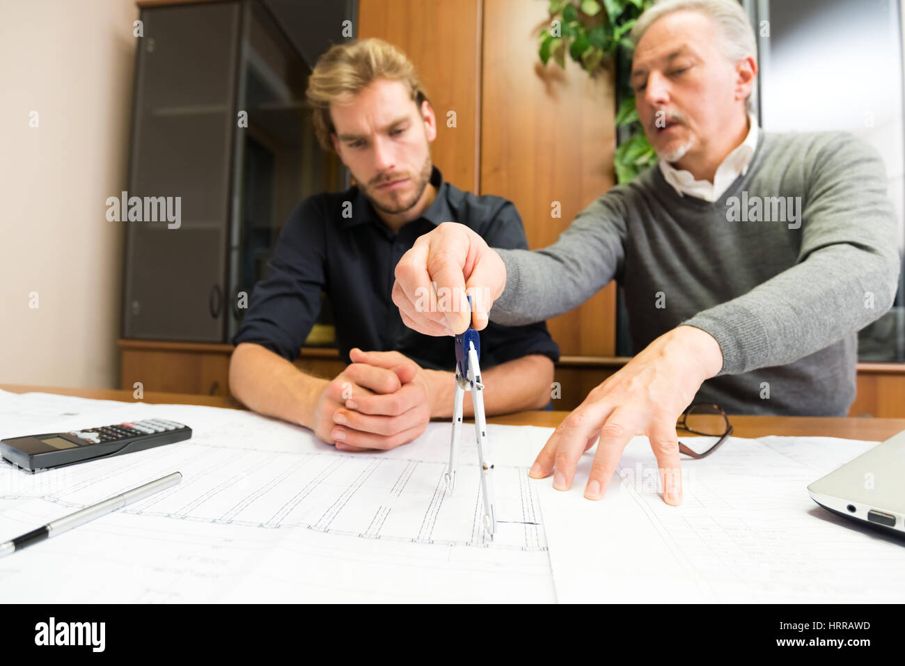 People at work in their office Stock Photo - Alamy