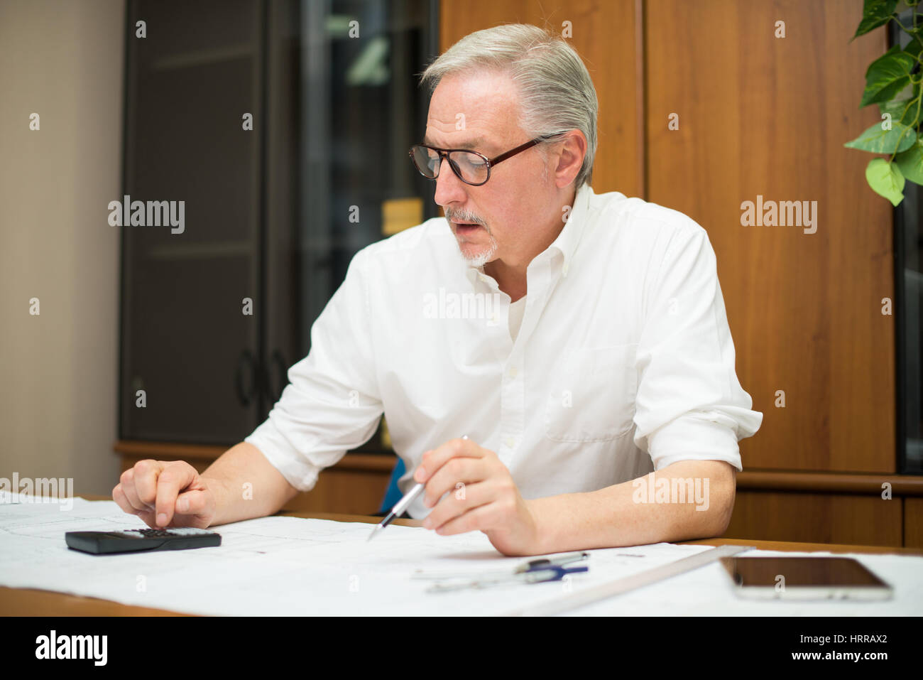Portrait man construction drawings hi-res stock photography and images ...