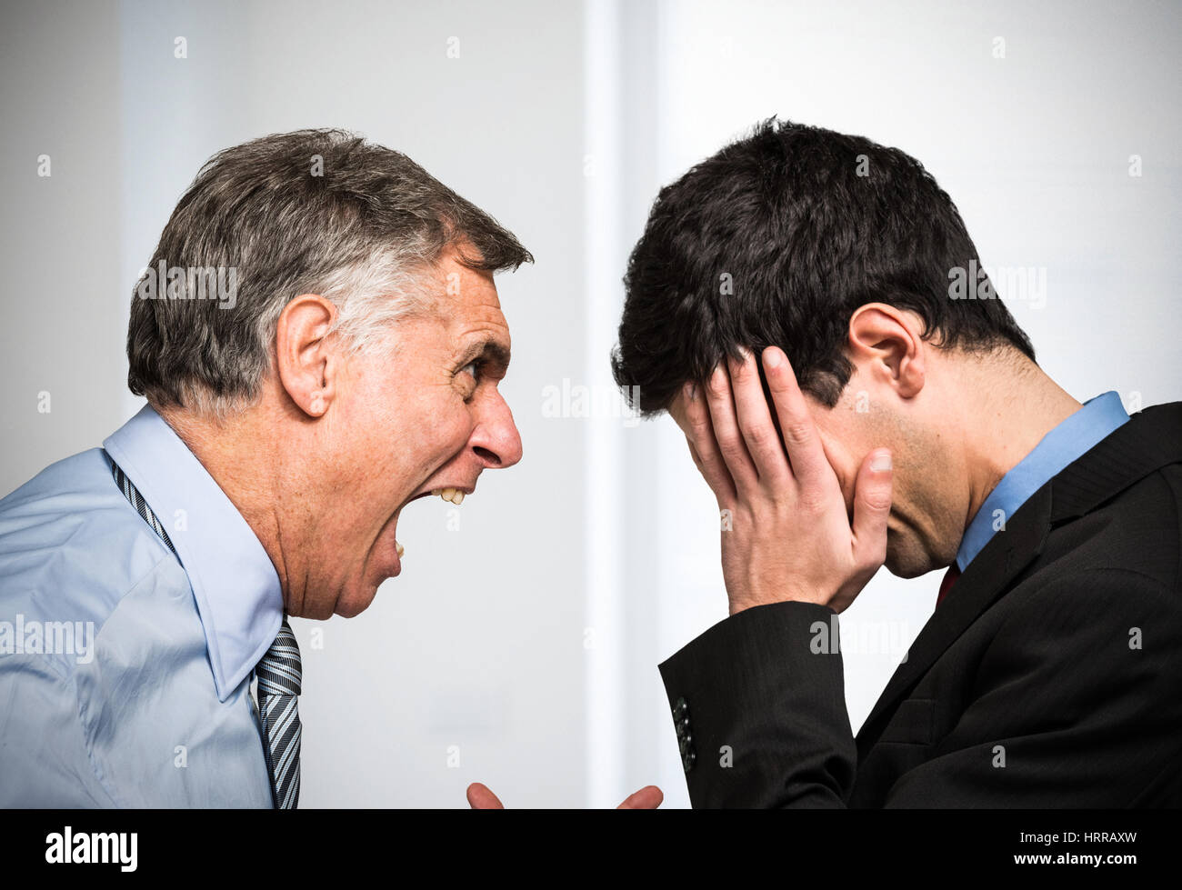 Angry boss shouting to an employee Stock Photo - Alamy