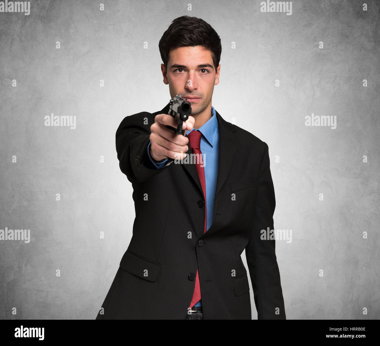 Man holding gun hi-res stock photography and images - Alamy