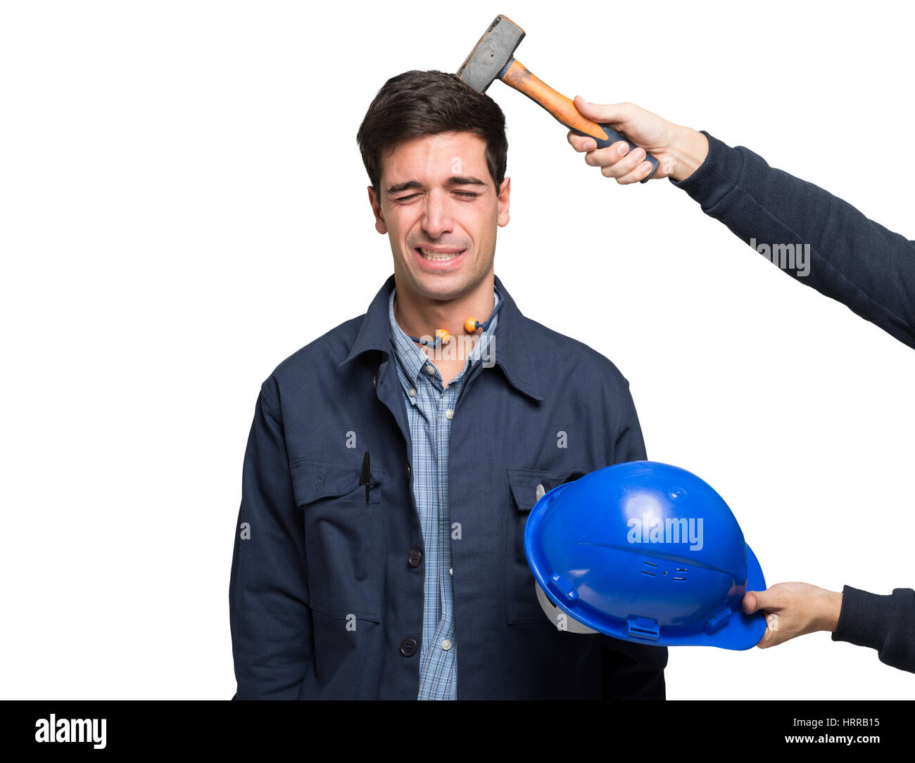 Worker taking an hammer blow on his head. Isolated on white Stock Photo ...