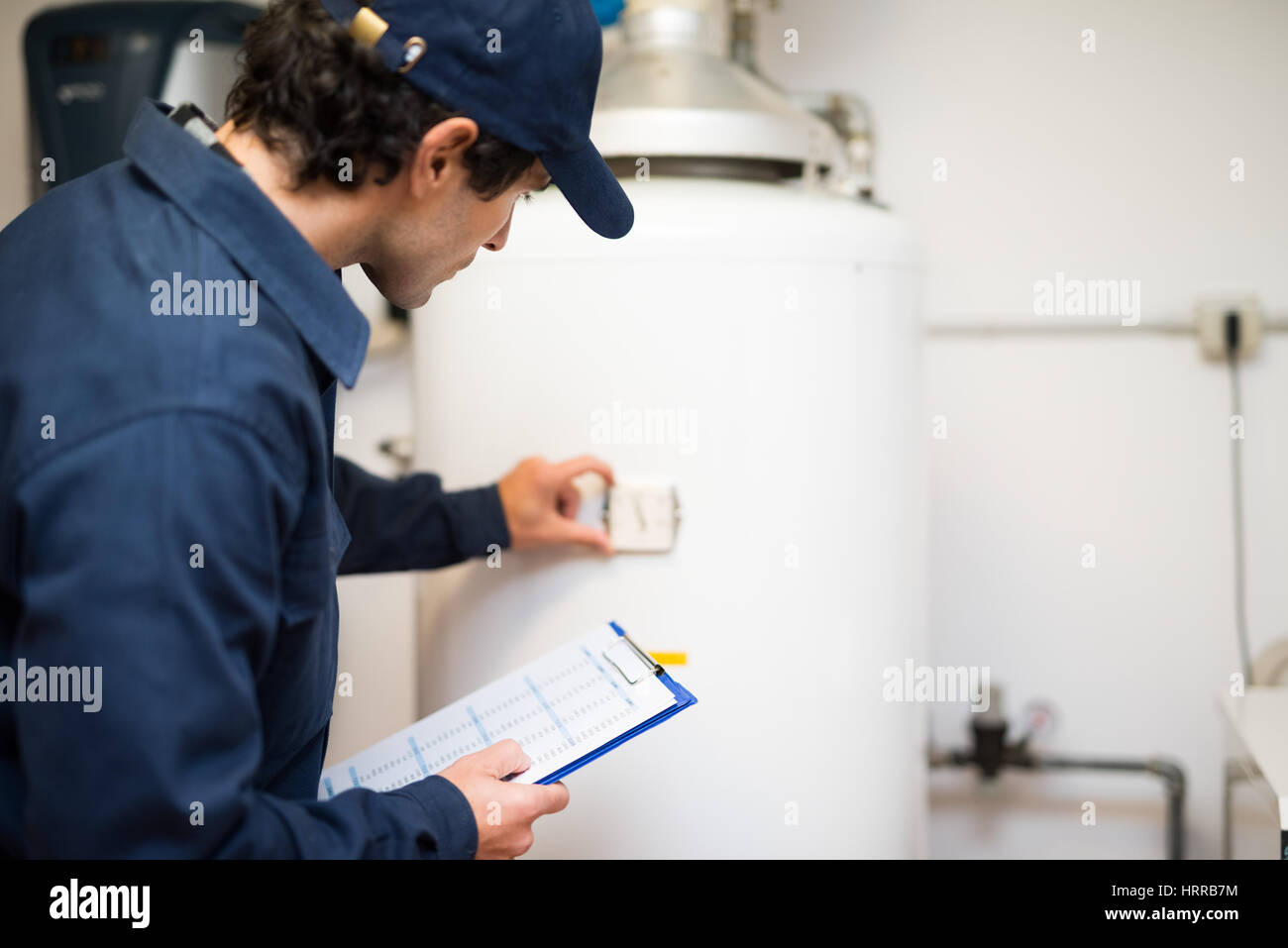 Plumber repairing hi-res stock photography and images - Alamy