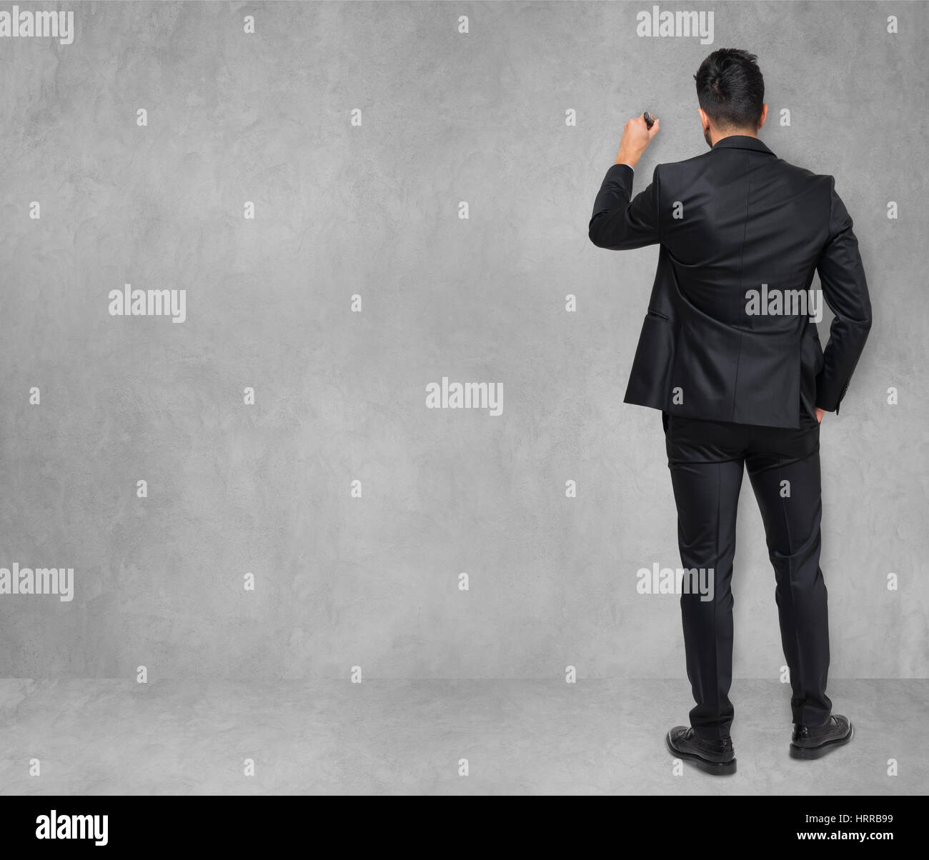 Black businessman behind wall hi-res stock photography and images - Alamy