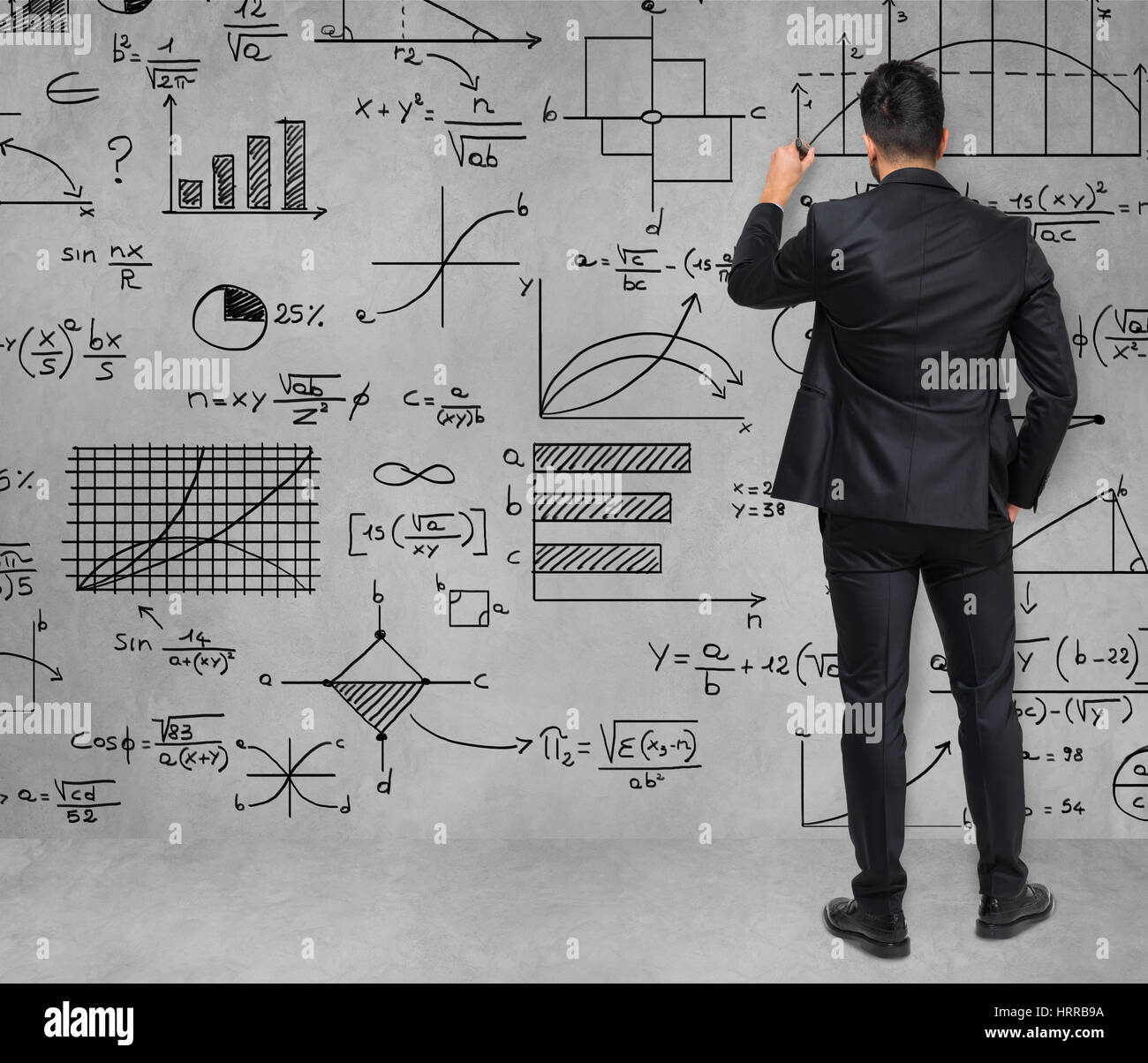 Businessman writing formulas on the screen Stock Photo - Alamy