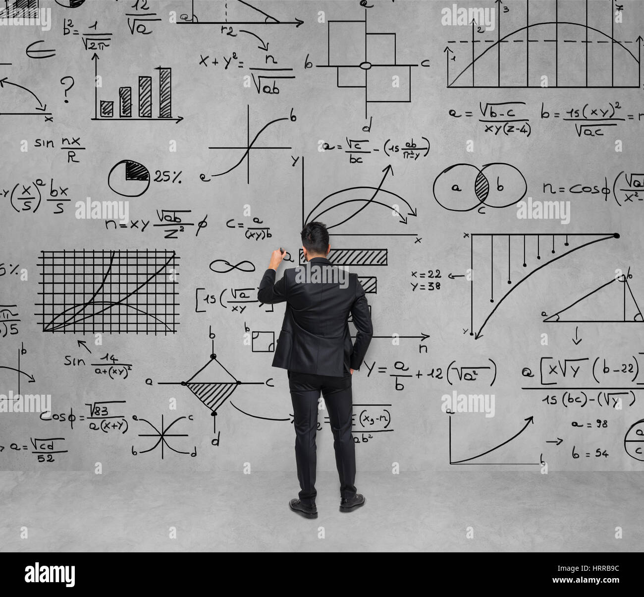 Businessman writing formulas on the screen Stock Photo - Alamy
