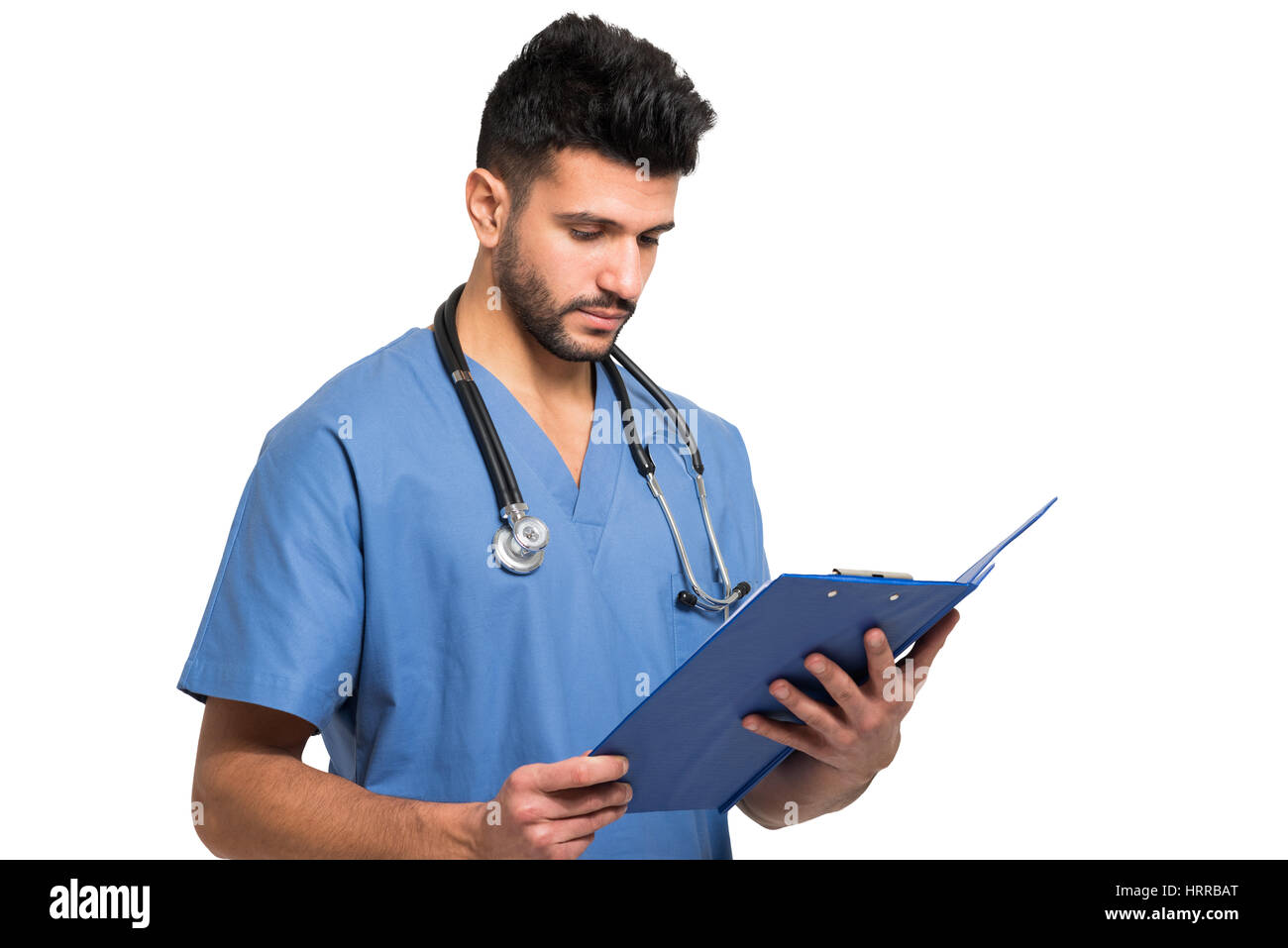 Doctor reading a document Stock Photo - Alamy