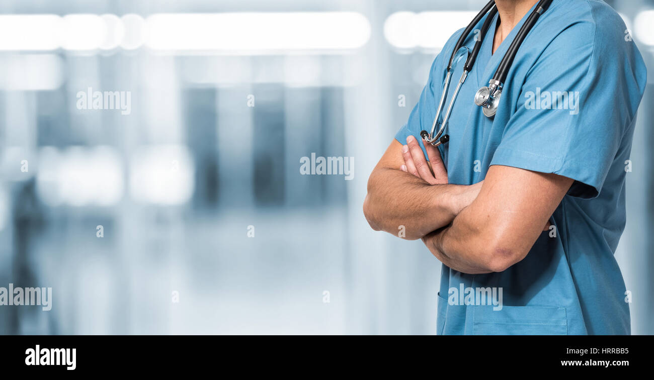 Doctor against a blue blurred background, Impersonal photo, no face ...