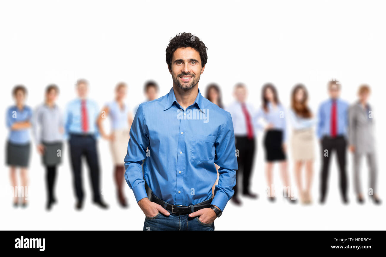Man in front of a group of people Stock Photo - Alamy