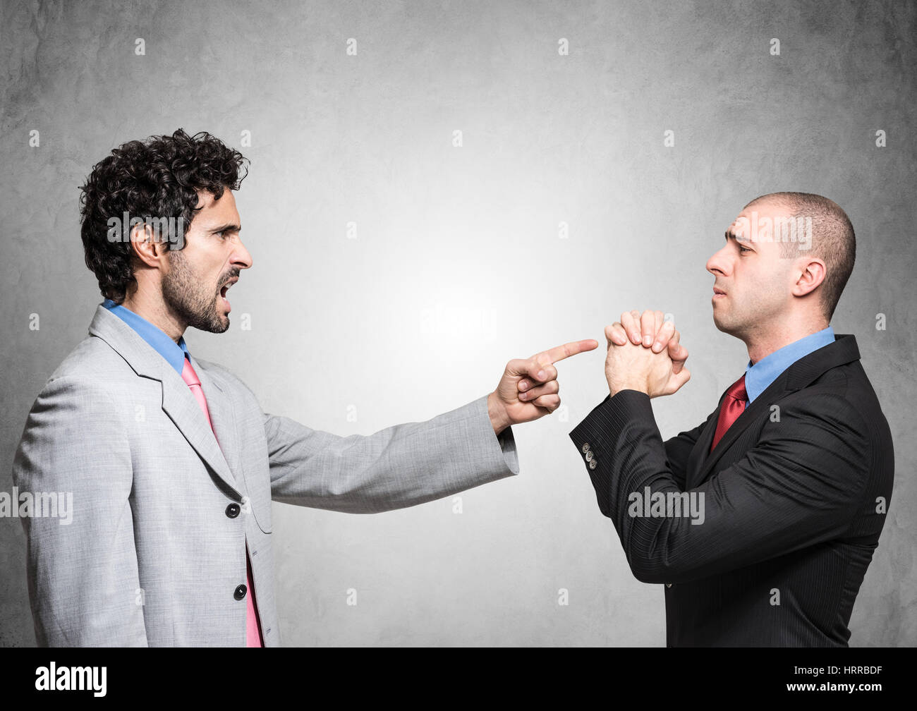 Boss firing a supplicating employee Stock Photo - Alamy
