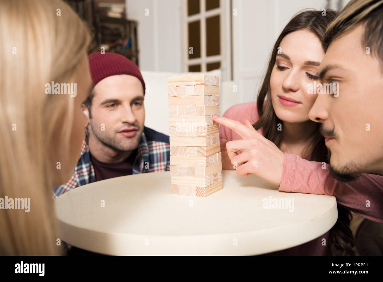 Friends playing jenga hi-res stock photography and images - Alamy
