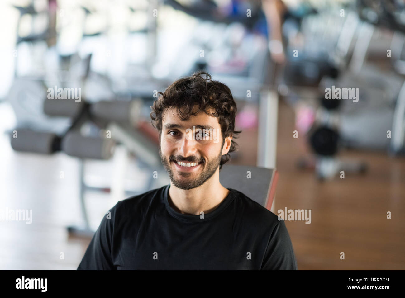Portrait of a man in a gym Stock Photo - Alamy