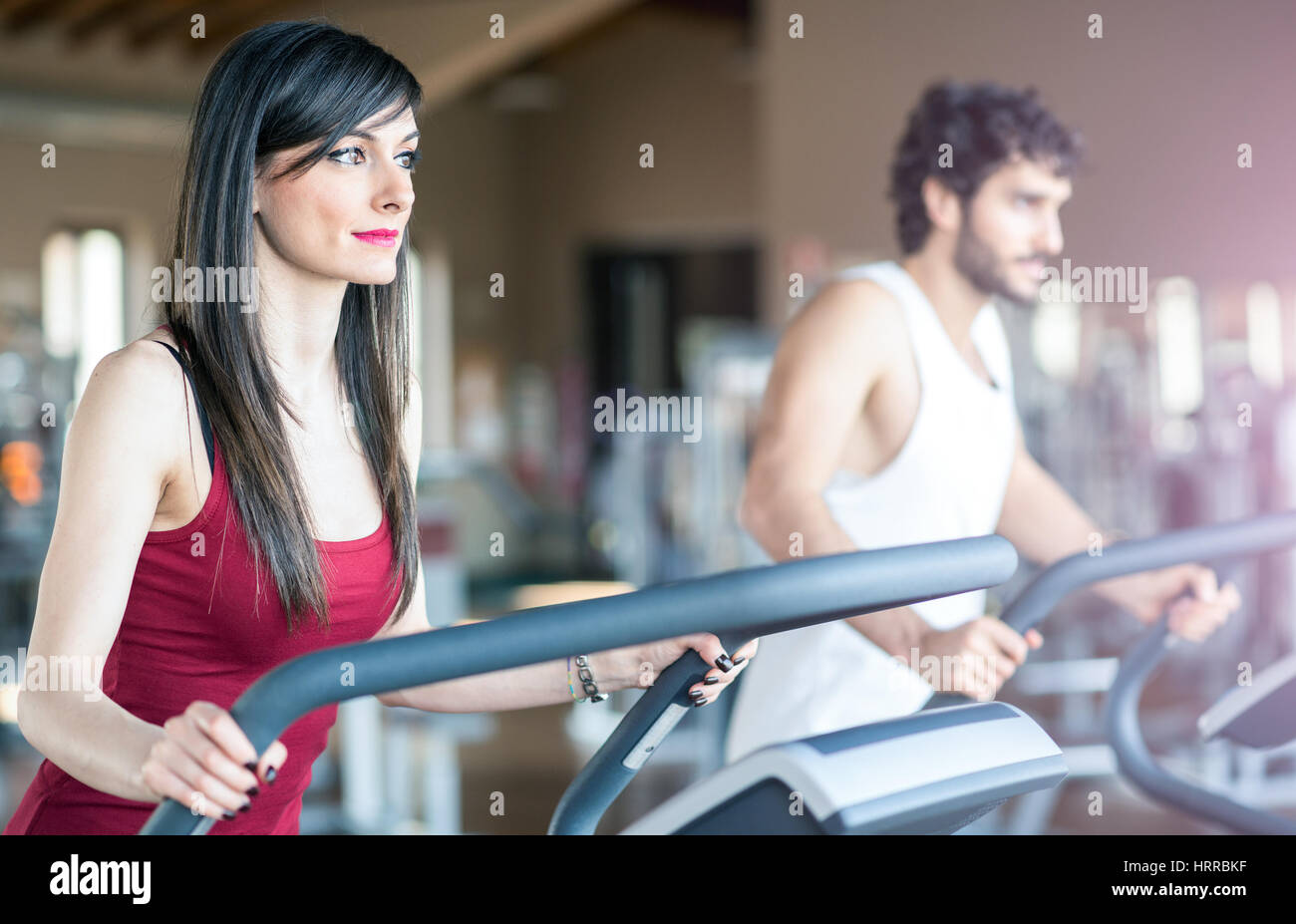 Fit people working out in a gym Stock Photo - Alamy