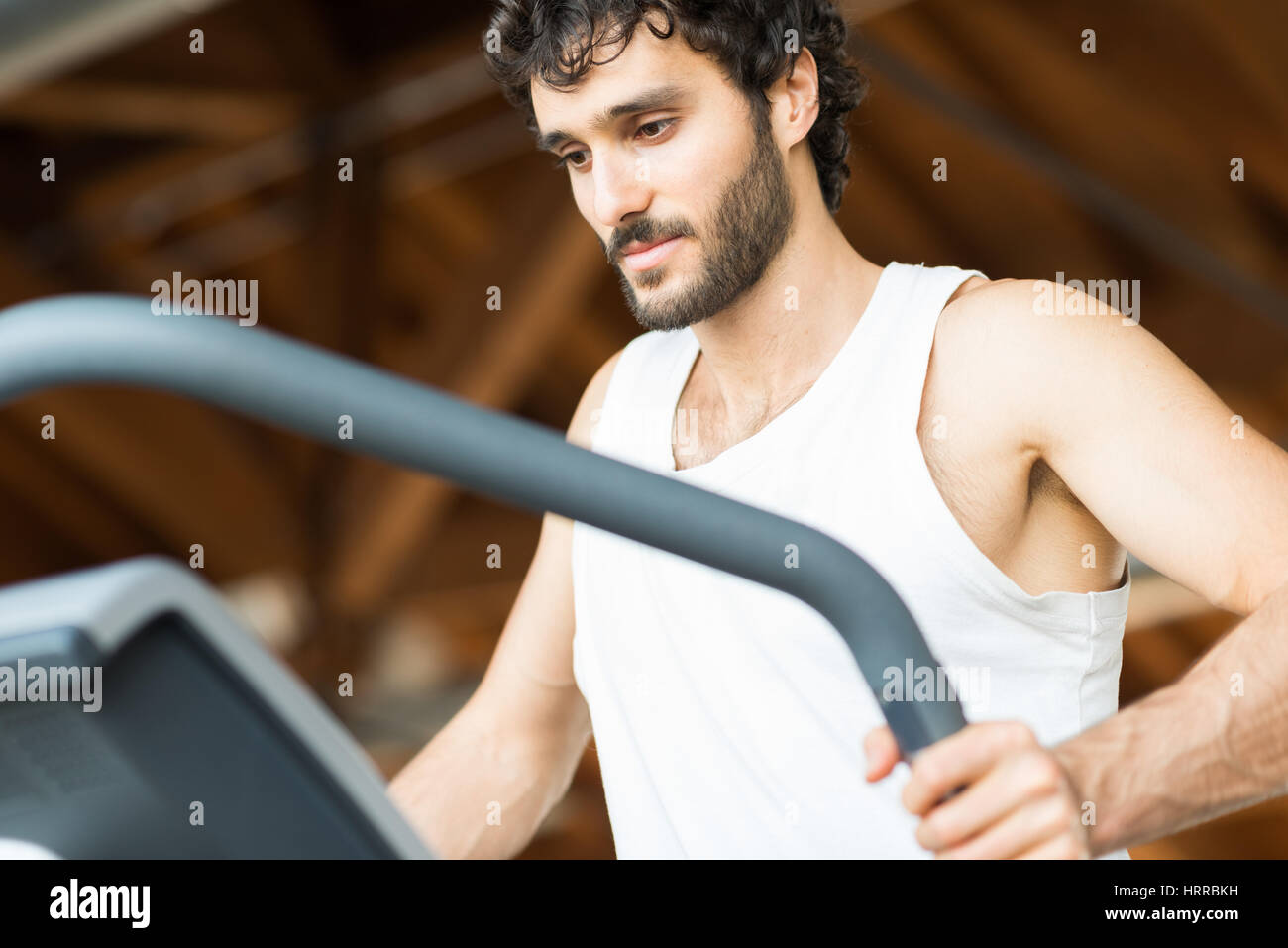 Man working out in a gym Stock Photo - Alamy