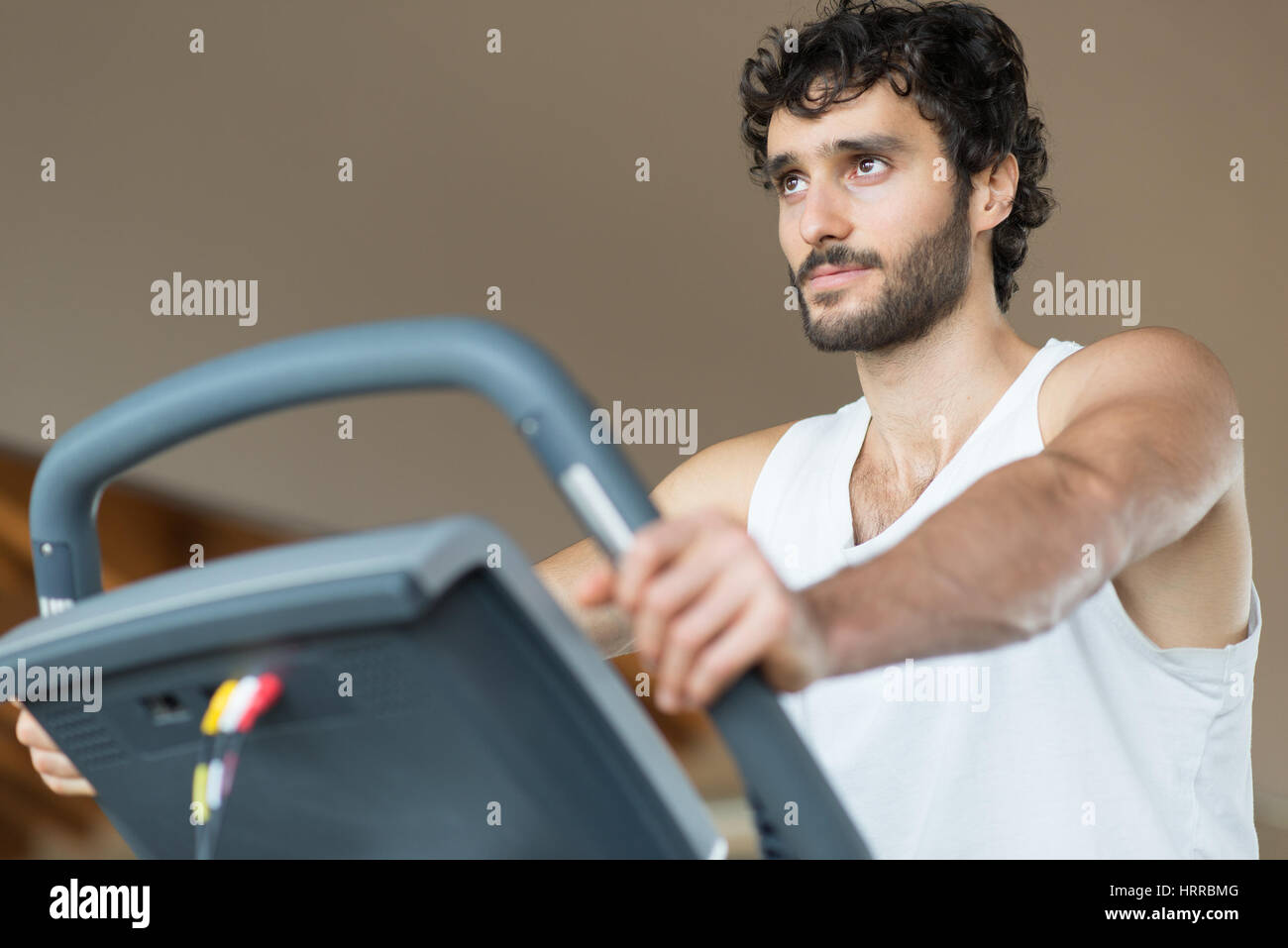Man working out in a gym Stock Photo - Alamy