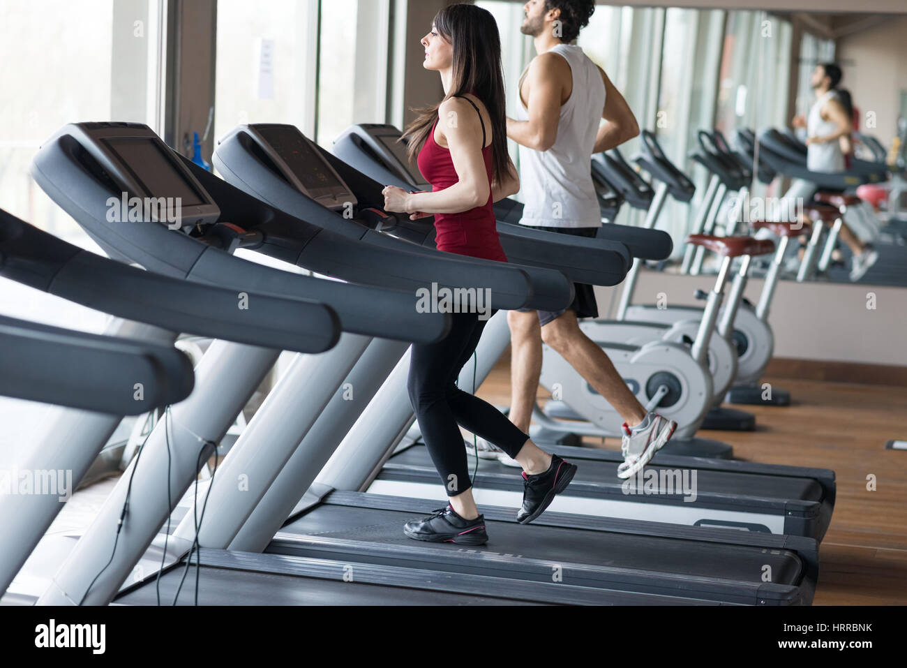 Woman legs run on treadmill hi-res stock photography and images - Alamy