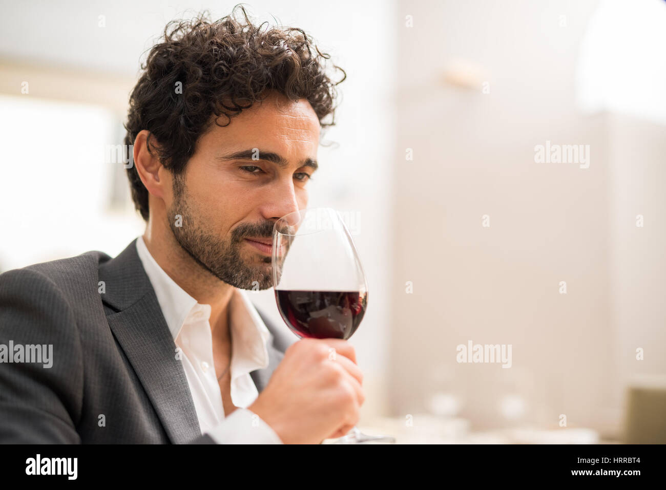 Man smelling glass red hi-res stock photography and images - Alamy