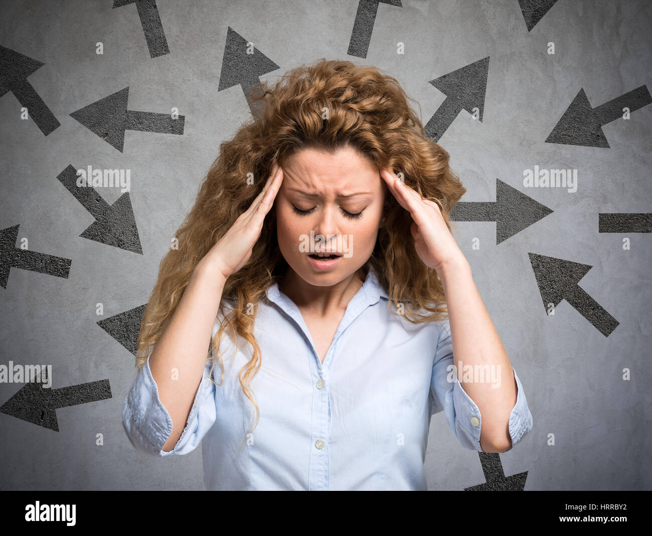 Woman trying to choose the right path Stock Photo - Alamy