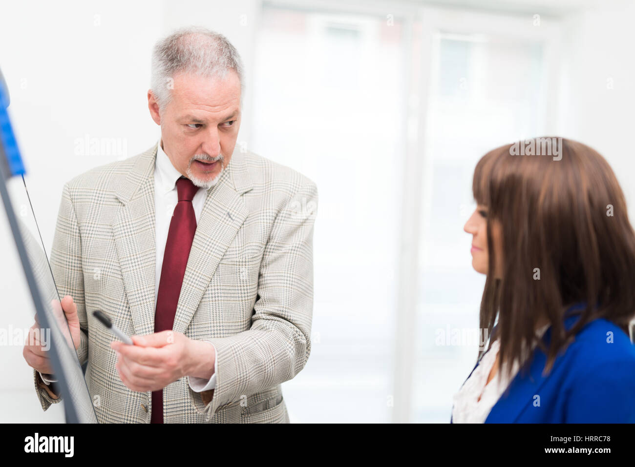 Explaining financial hi-res stock photography and images - Alamy