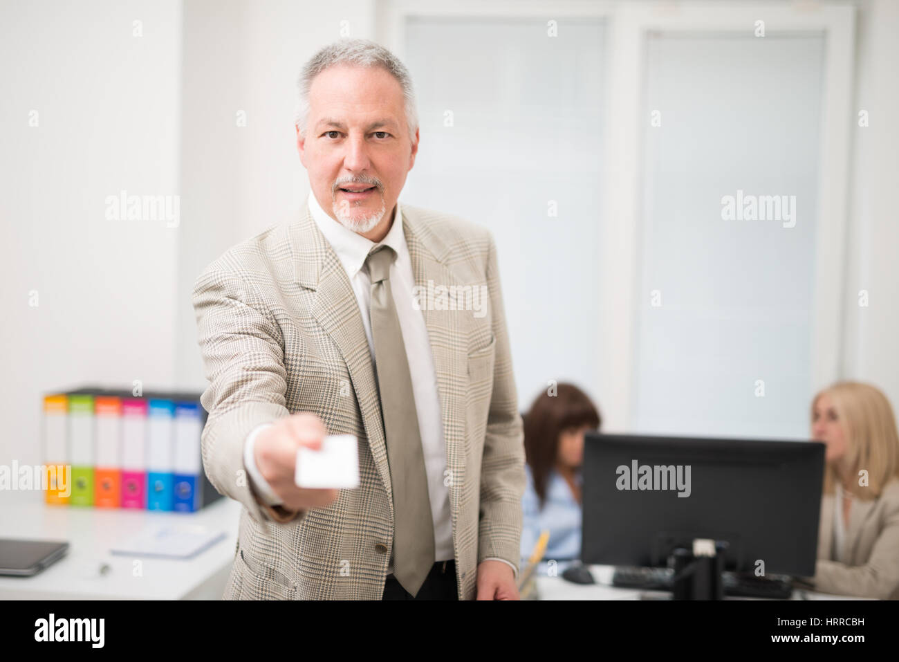 Giving his business card hi-res stock photography and images - Alamy