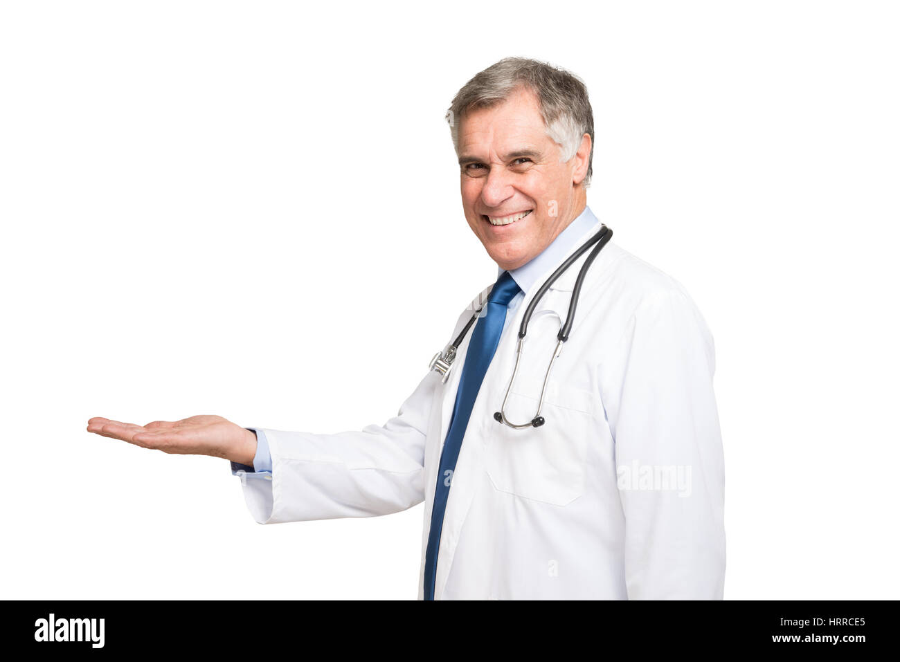 Doctor showing his open hand, you can put your product on it. Isolated ...