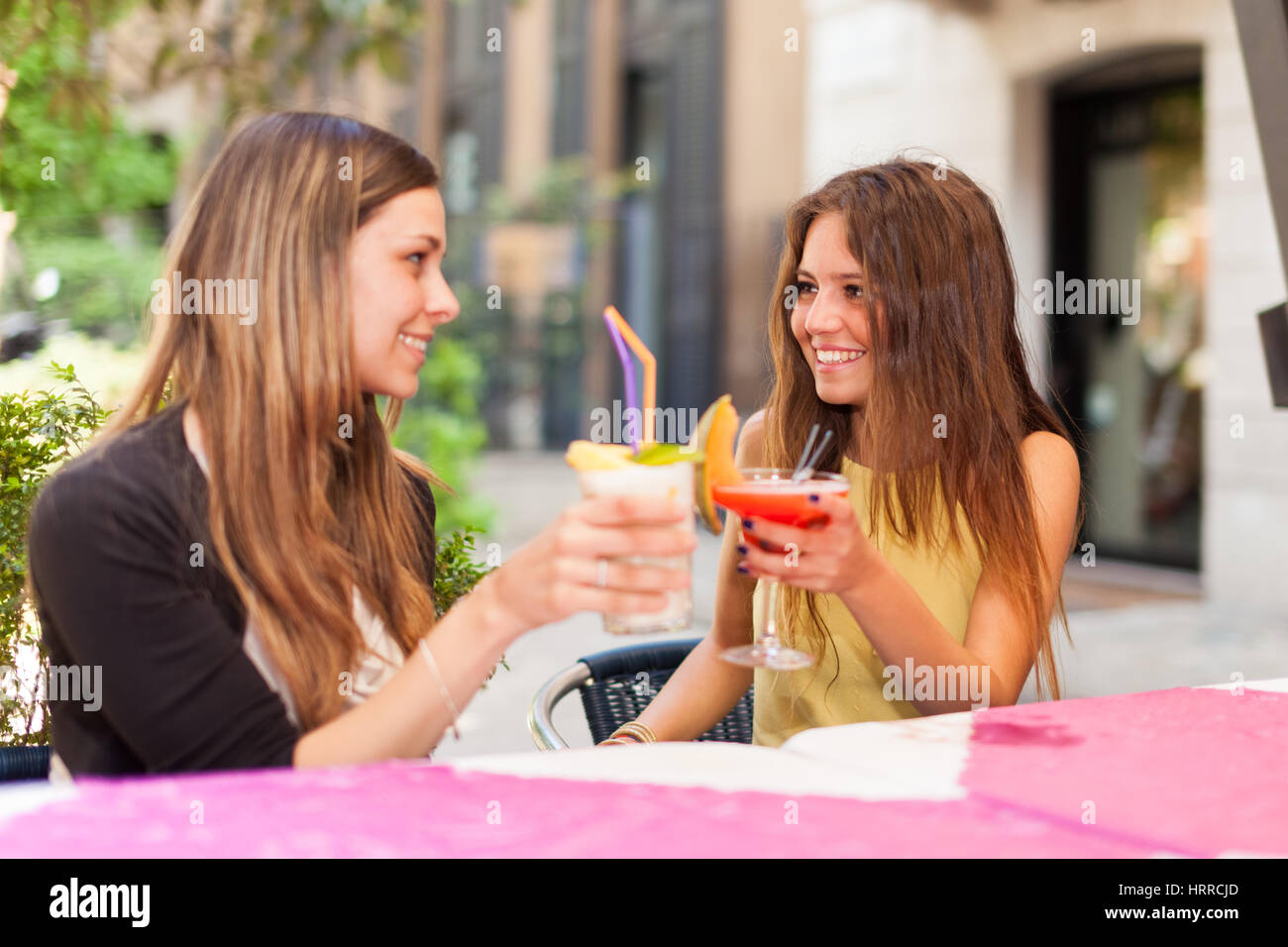 Two girls bar cocktail drink hi-res stock photography and images - Alamy