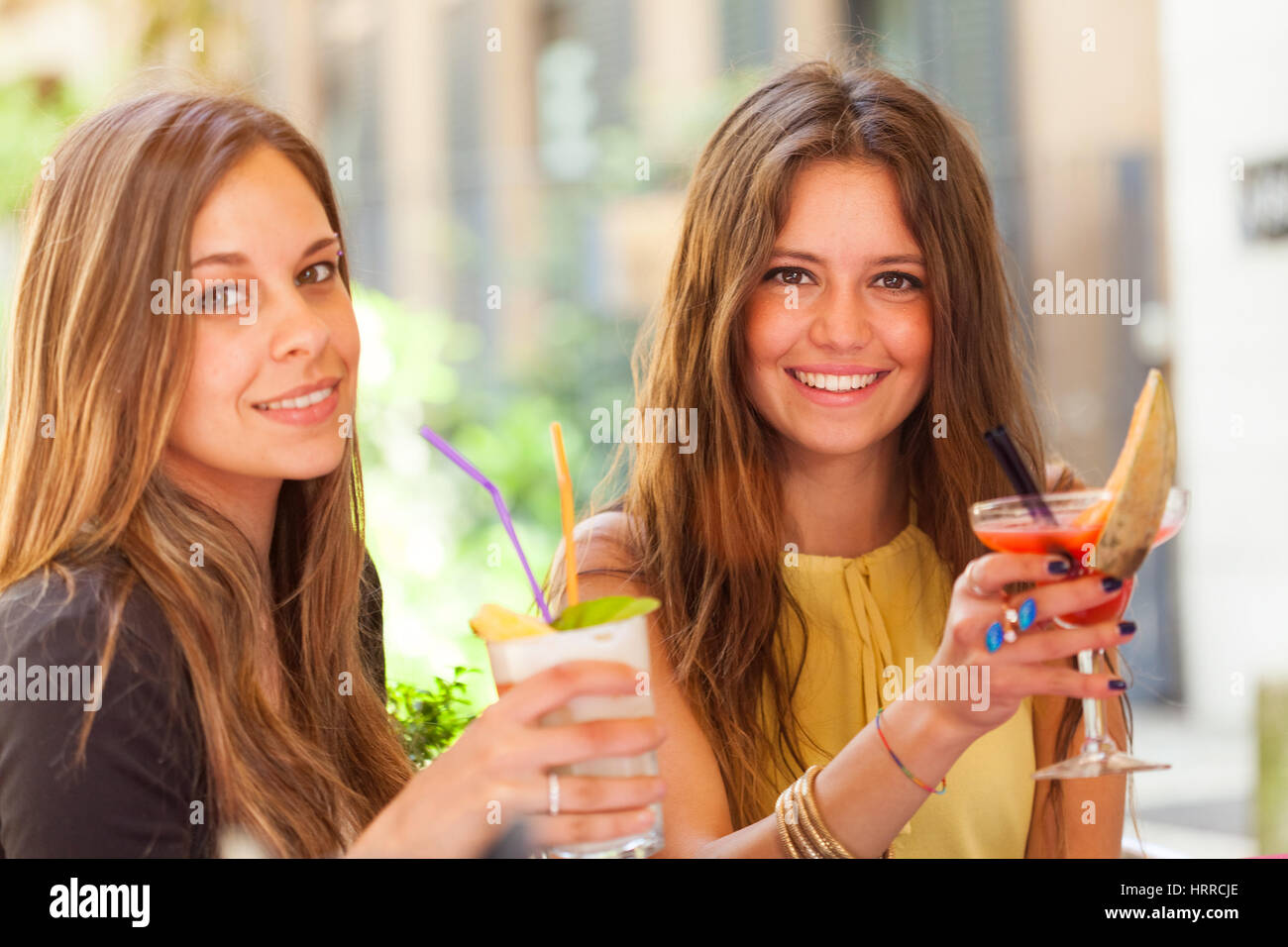 Two girls bar cocktail drink hi-res stock photography and images - Alamy