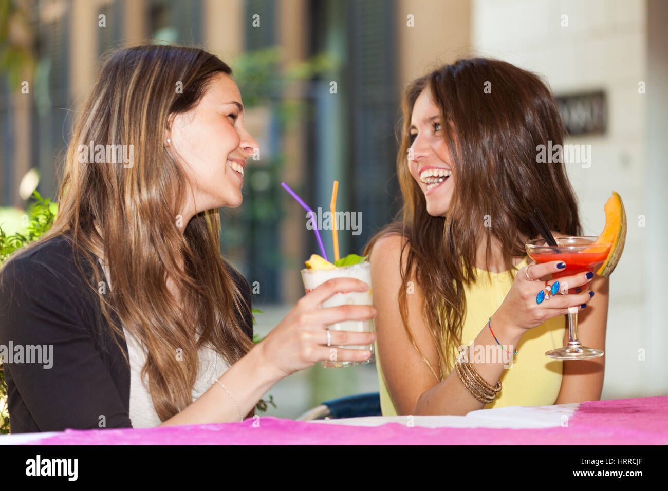 Two girls bar cocktail drink hi-res stock photography and images - Alamy