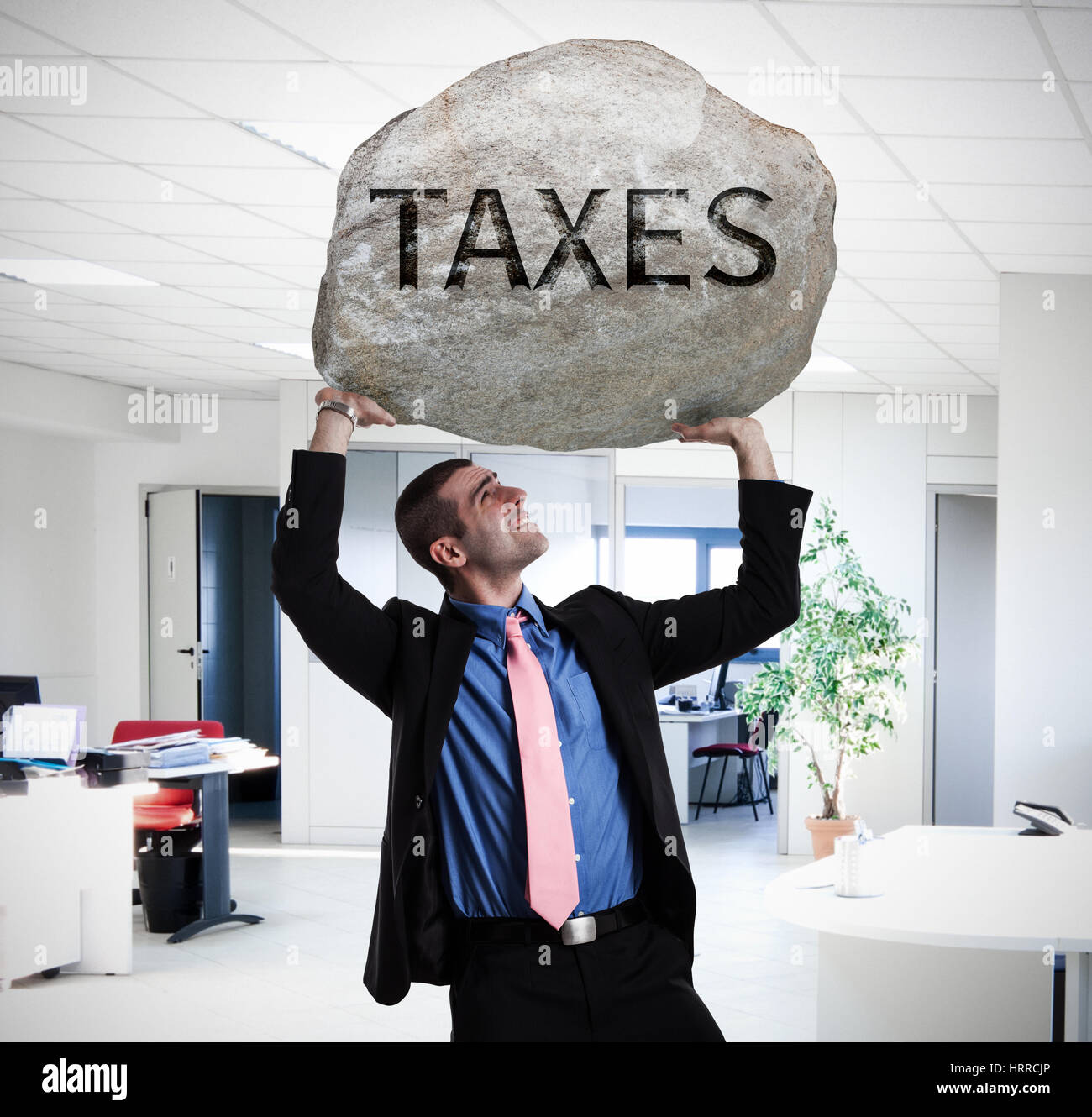 Heavy taxation concept Stock Photo - Alamy