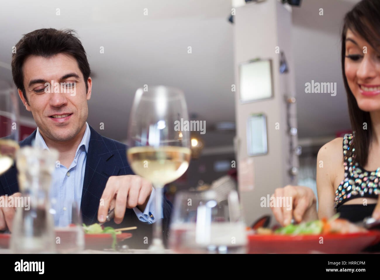 Couple having dinner in a restaurant together Stock Photo - Alamy