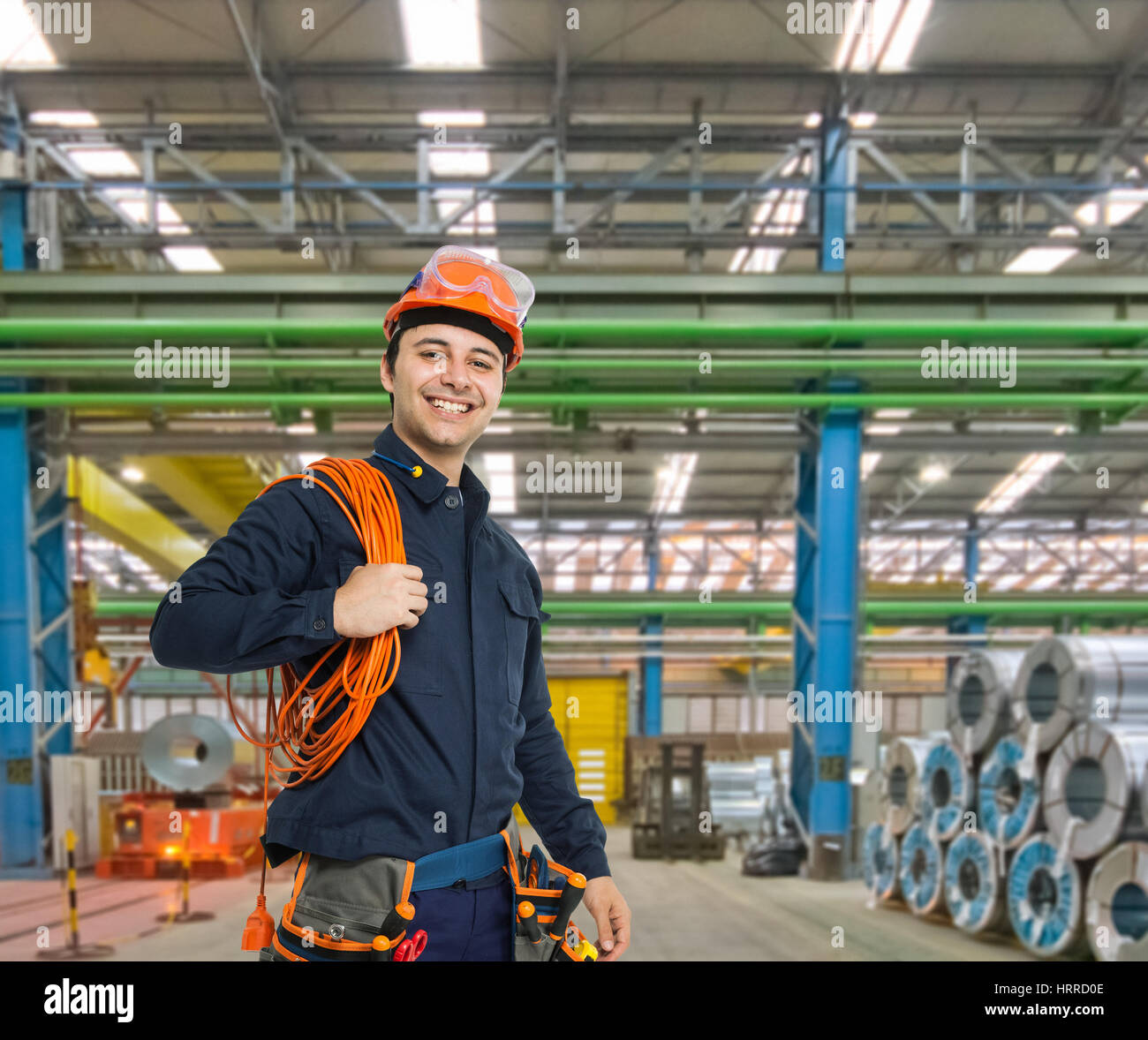 Portrait of a smiling engineer in a factory Stock Photo - Alamy