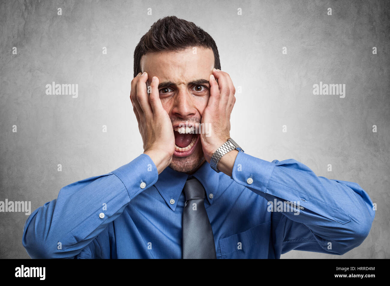Portrait of a desperate businessman Stock Photo - Alamy