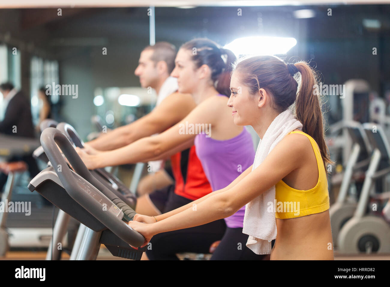 Group of people doing fitness in a gym Stock Photo - Alamy