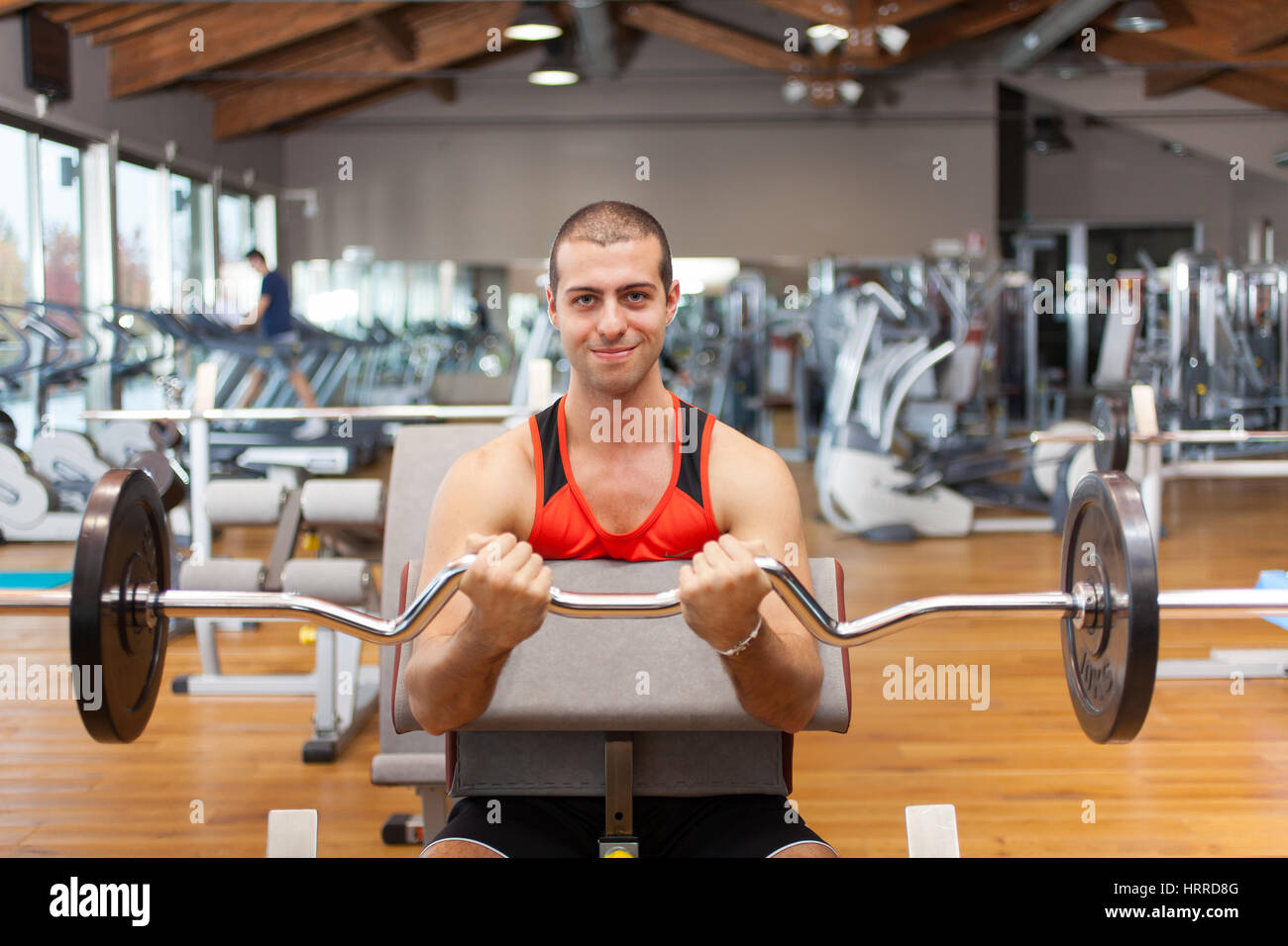 Man working out in a gym Stock Photo - Alamy