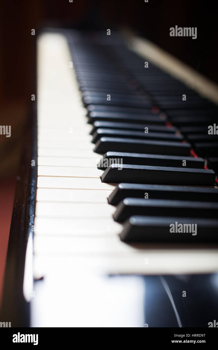Grand piano keyboard close-up Stock Photo - Alamy