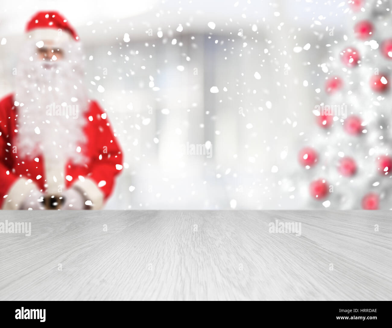 Empty table in front of blurred Santa Claus and Christmas tree Stock ...