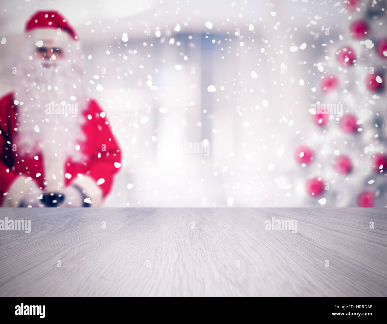 Empty table in front of blurred Santa Claus and Christmas tree. Vintage ...