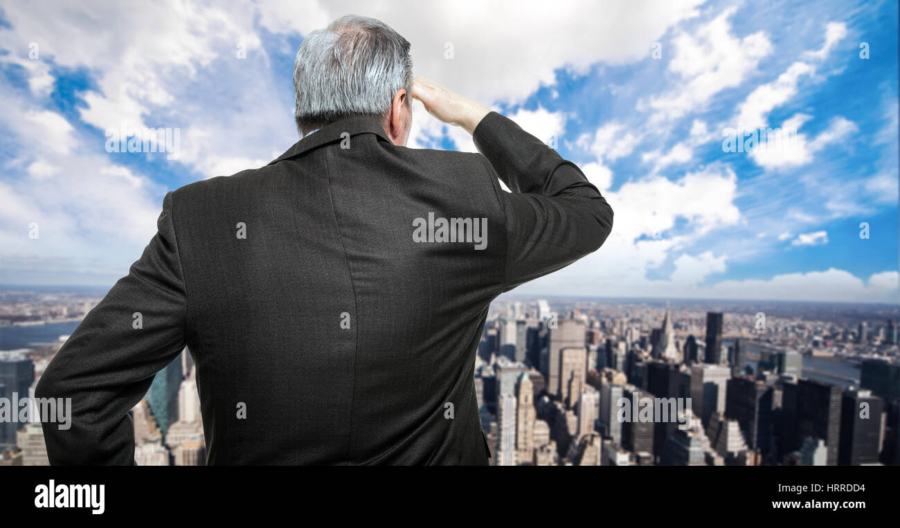 Business man looking at his city Stock Photo - Alamy