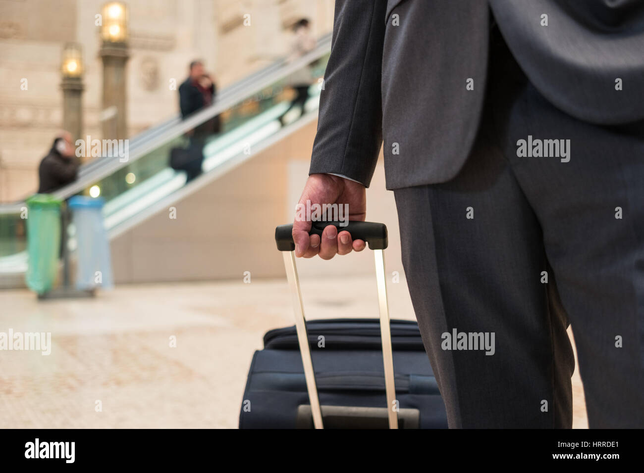 Detail of a traveler pushing his trolley Stock Photo - Alamy