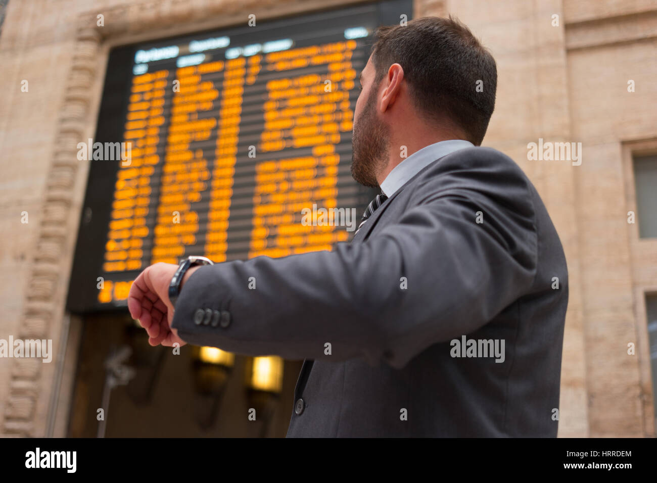 Checking train timetable hi-res stock photography and images - Alamy
