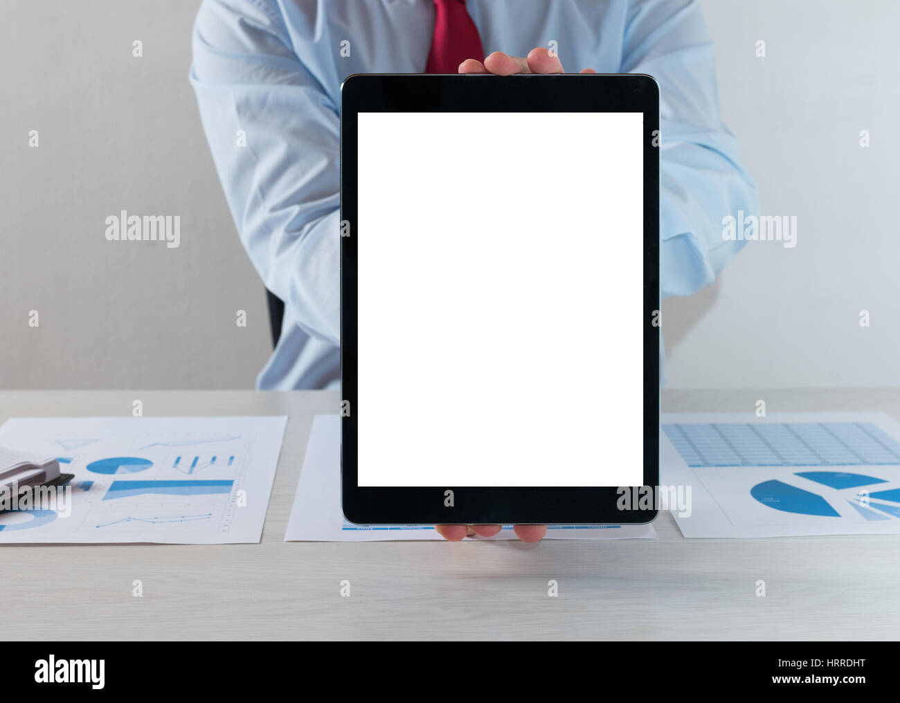 Man showing a tablet. White screen Stock Photo - Alamy