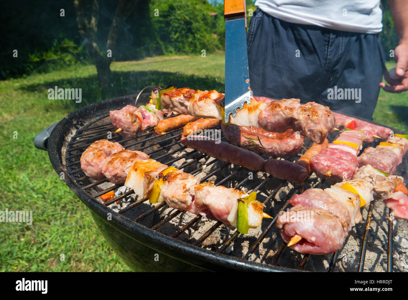 Detail of meat on a barbeque grill Stock Photo - Alamy