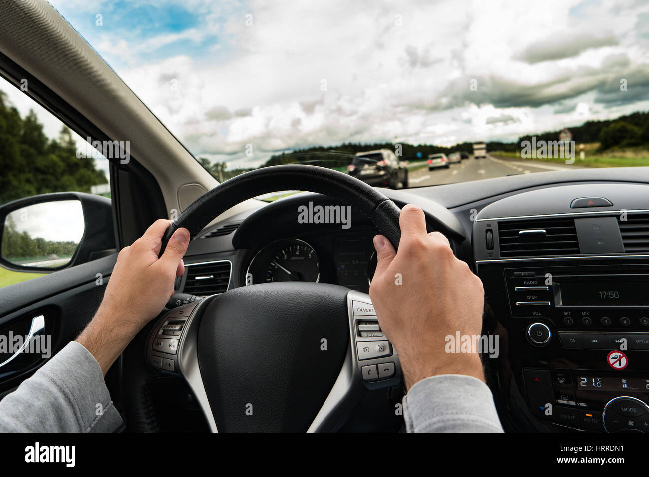 Detail of a man driving his car Stock Photo - Alamy
