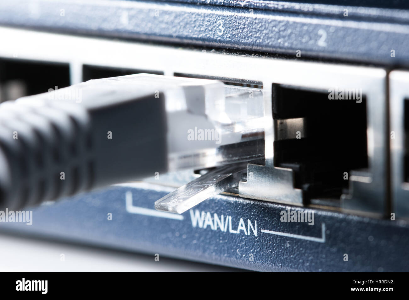 Patch cable in an ethernet port Stock Photo - Alamy