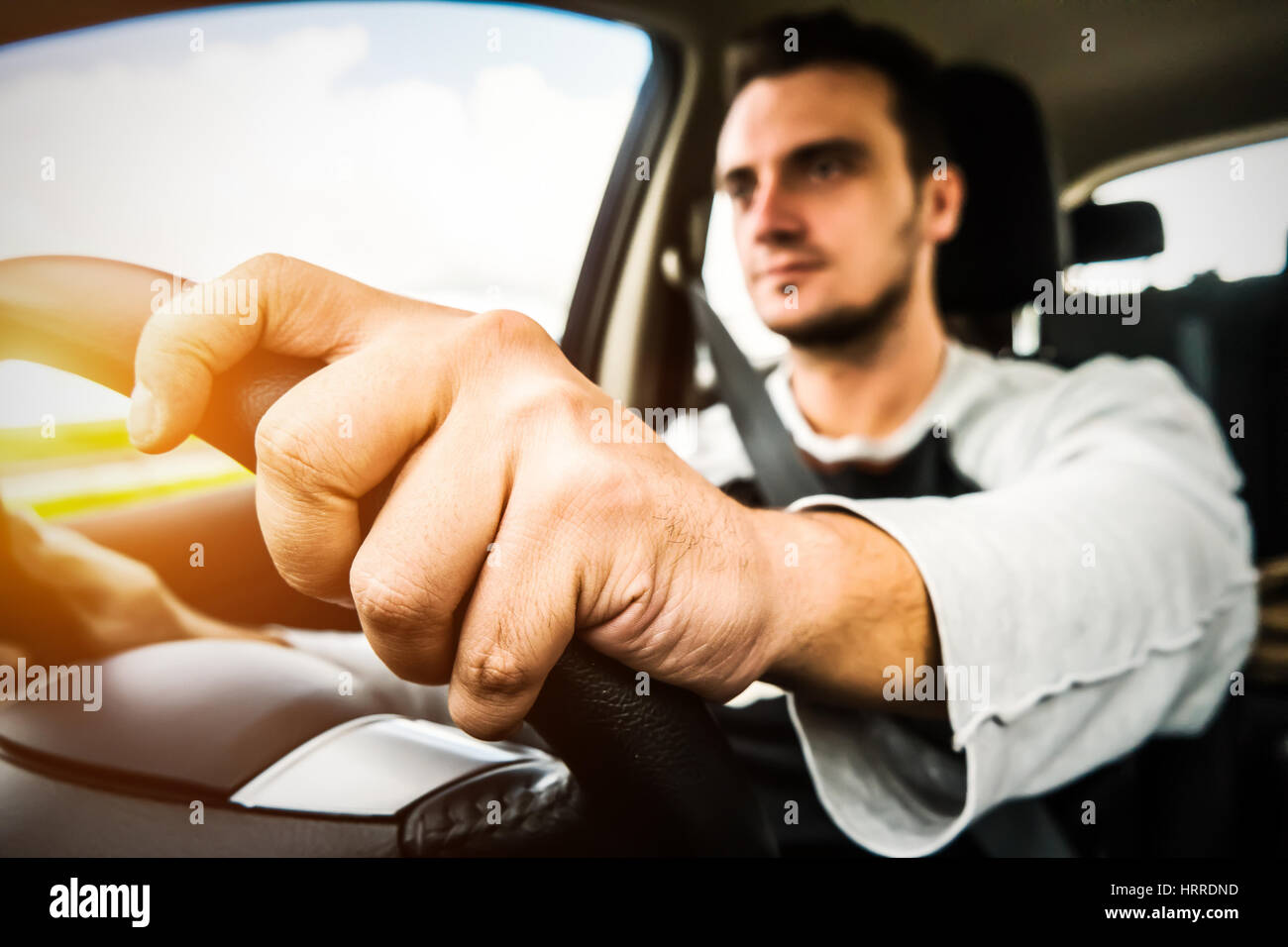 Man driving his car Stock Photo - Alamy