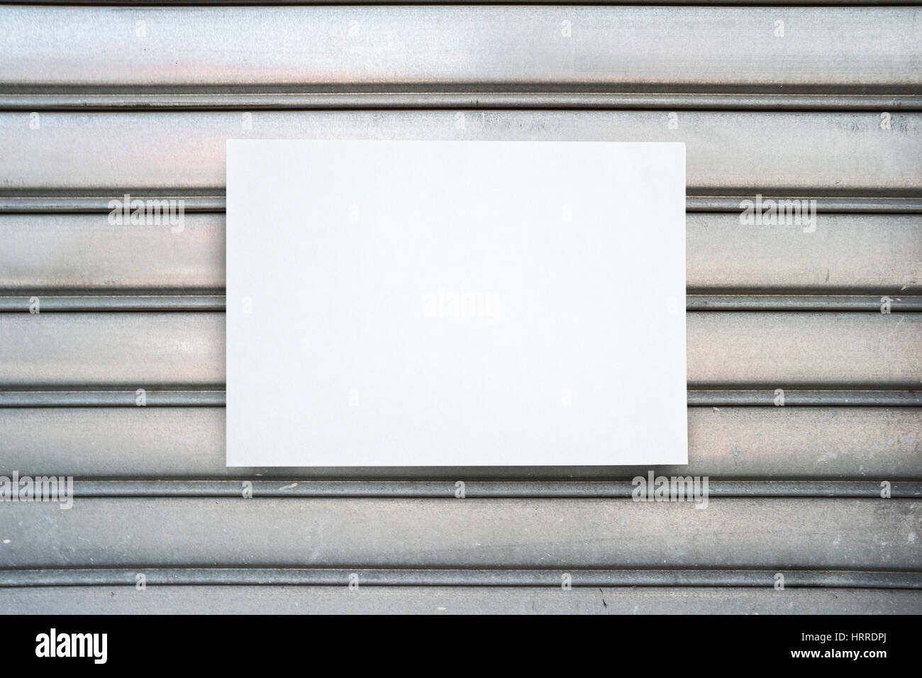 White paper sheet sticked on a closed shop door Stock Photo - Alamy