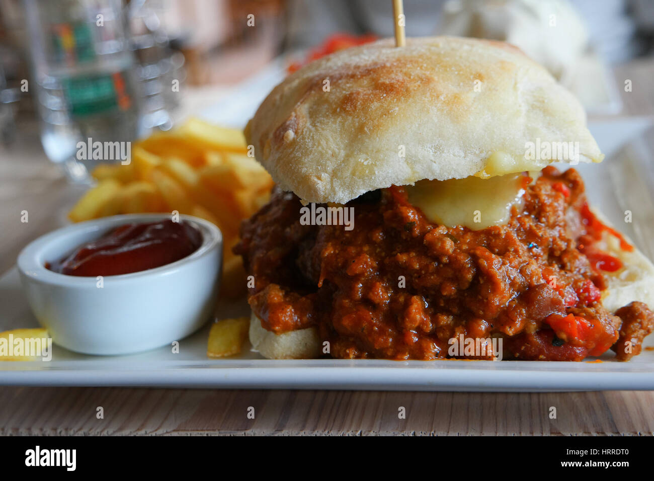 Chilli sandwich, french fries and spicy sauce Stock Photo - Alamy
