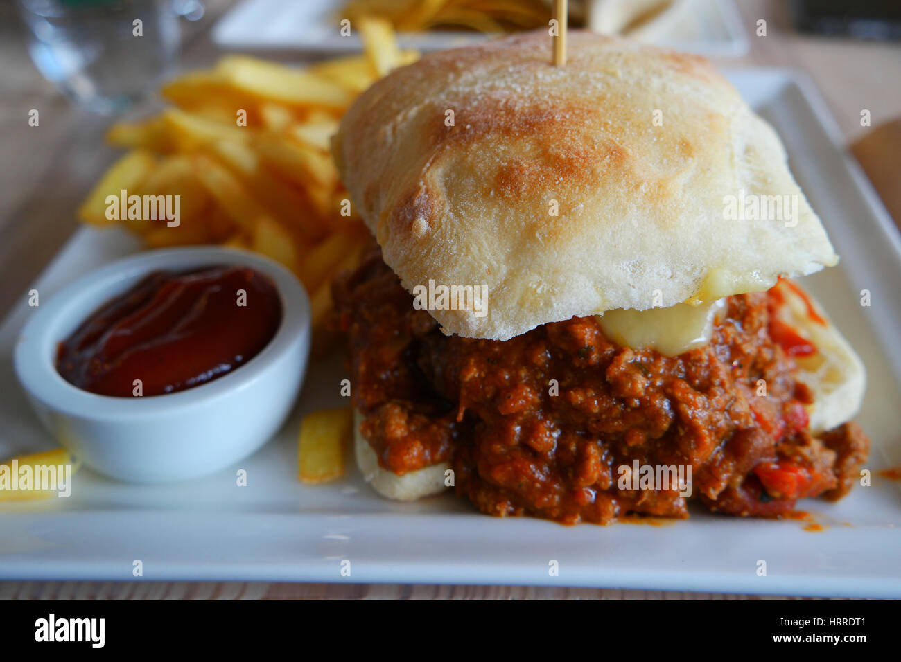 Chilli sandwich, french fries and spicy sauce Stock Photo - Alamy