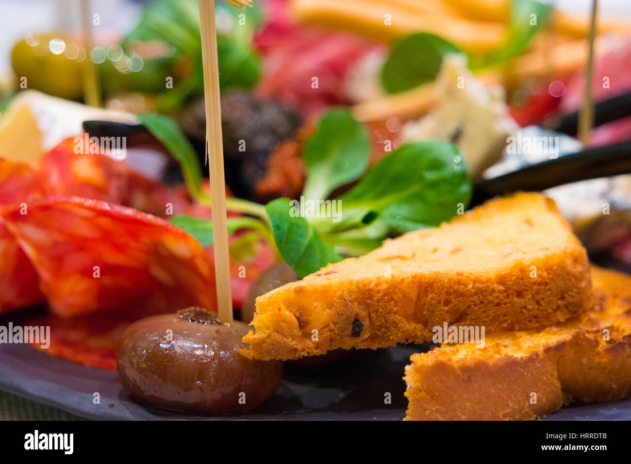 Close-up of a mixed italian appetizers plate Stock Photo - Alamy
